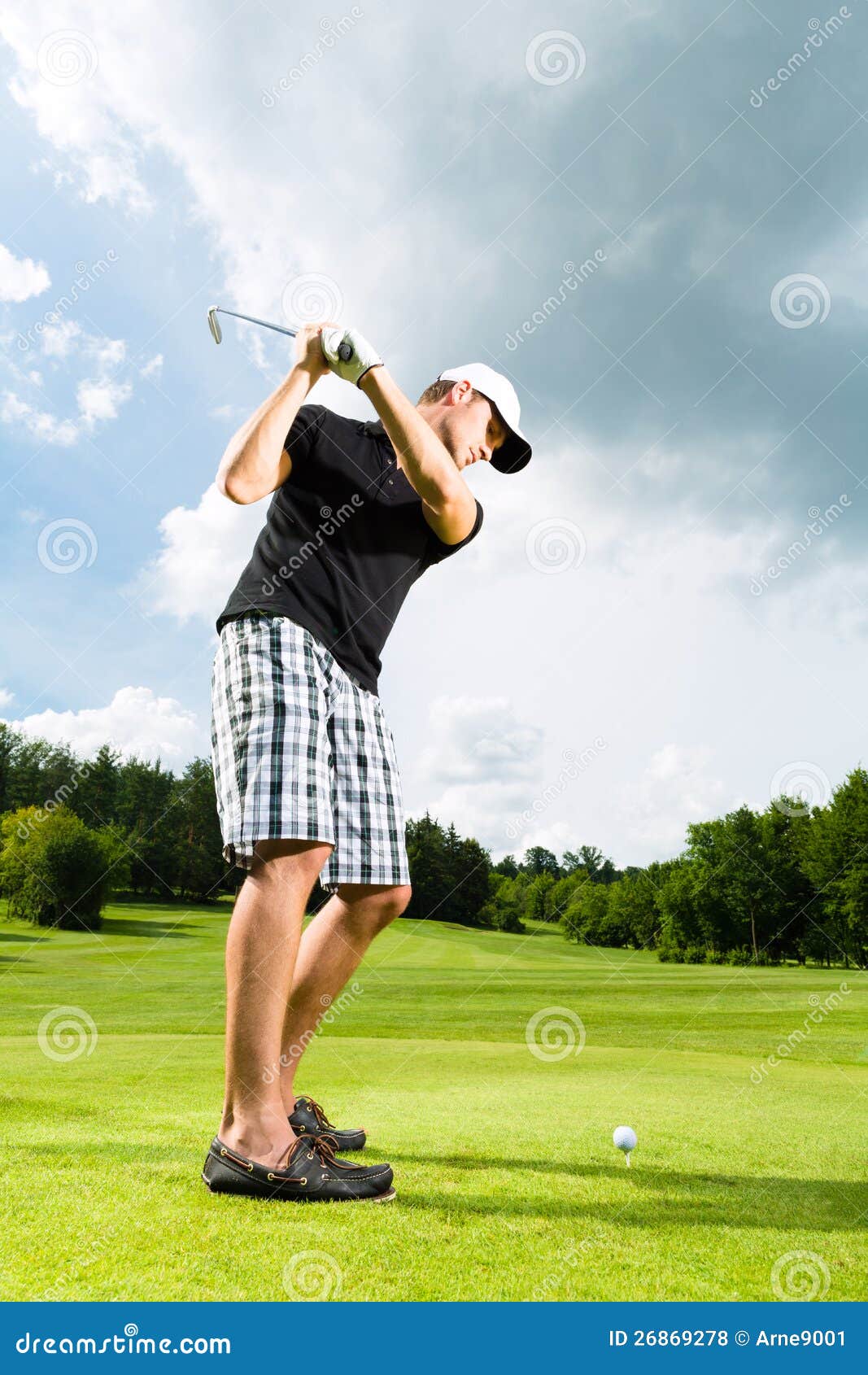Young Golf Player on Course Doing Golf Swing Stock Photo - Image of ...