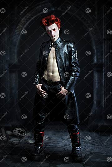 Young goth with a red hair stock photo. Image of leather - 13571218