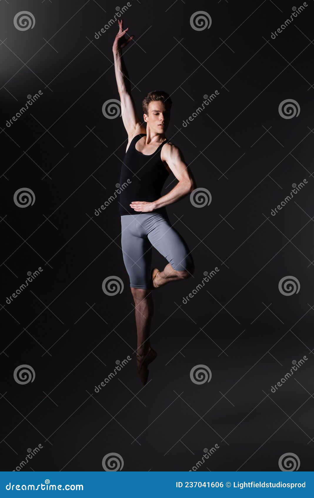 Young and Graceful Dancer Gesturing while Stock Photo - Image of ease ...