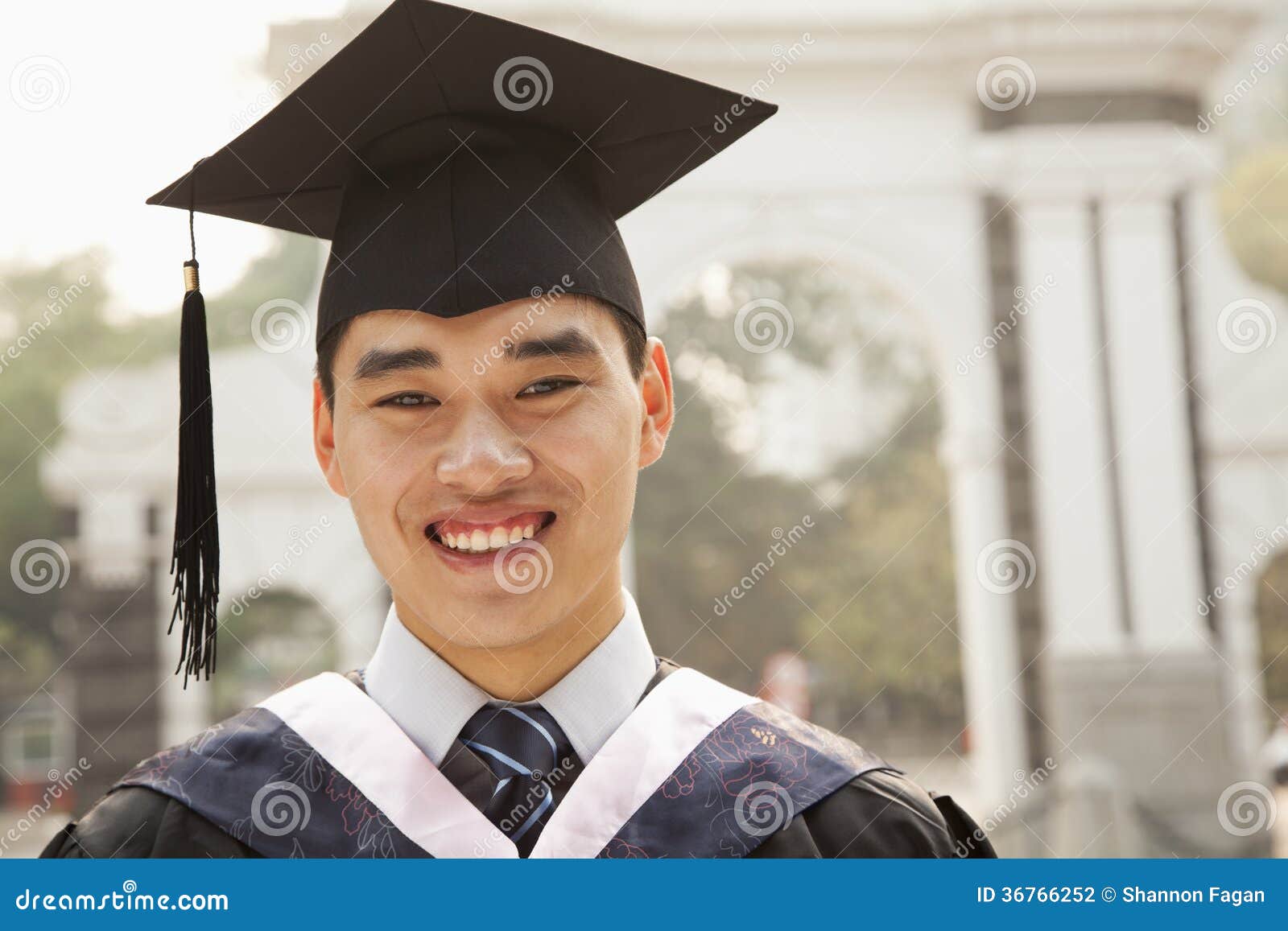 Young Graduate in Cap and Gown Stock Photo - Image of beijing, head ...