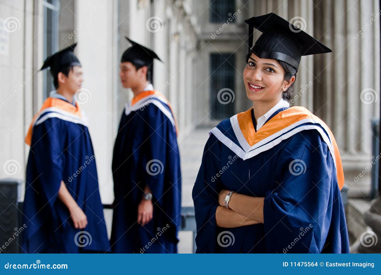 Young Graduates stock photo. Image of education, gown - 11475564