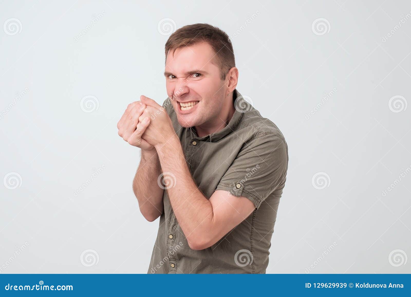 A Young Greedy Man Hides Something in His Hands Stock Image - Image of ...