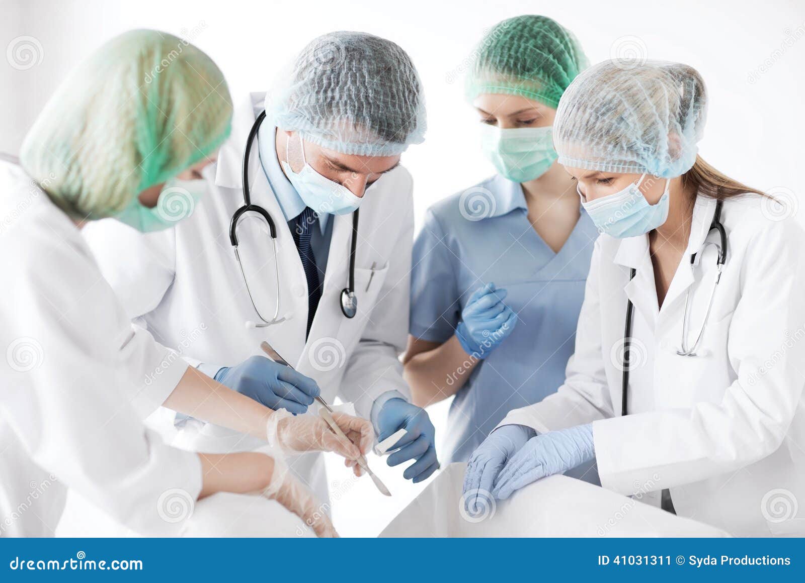Young Group of Doctors Doing Operation Stock Image - Image of room ...