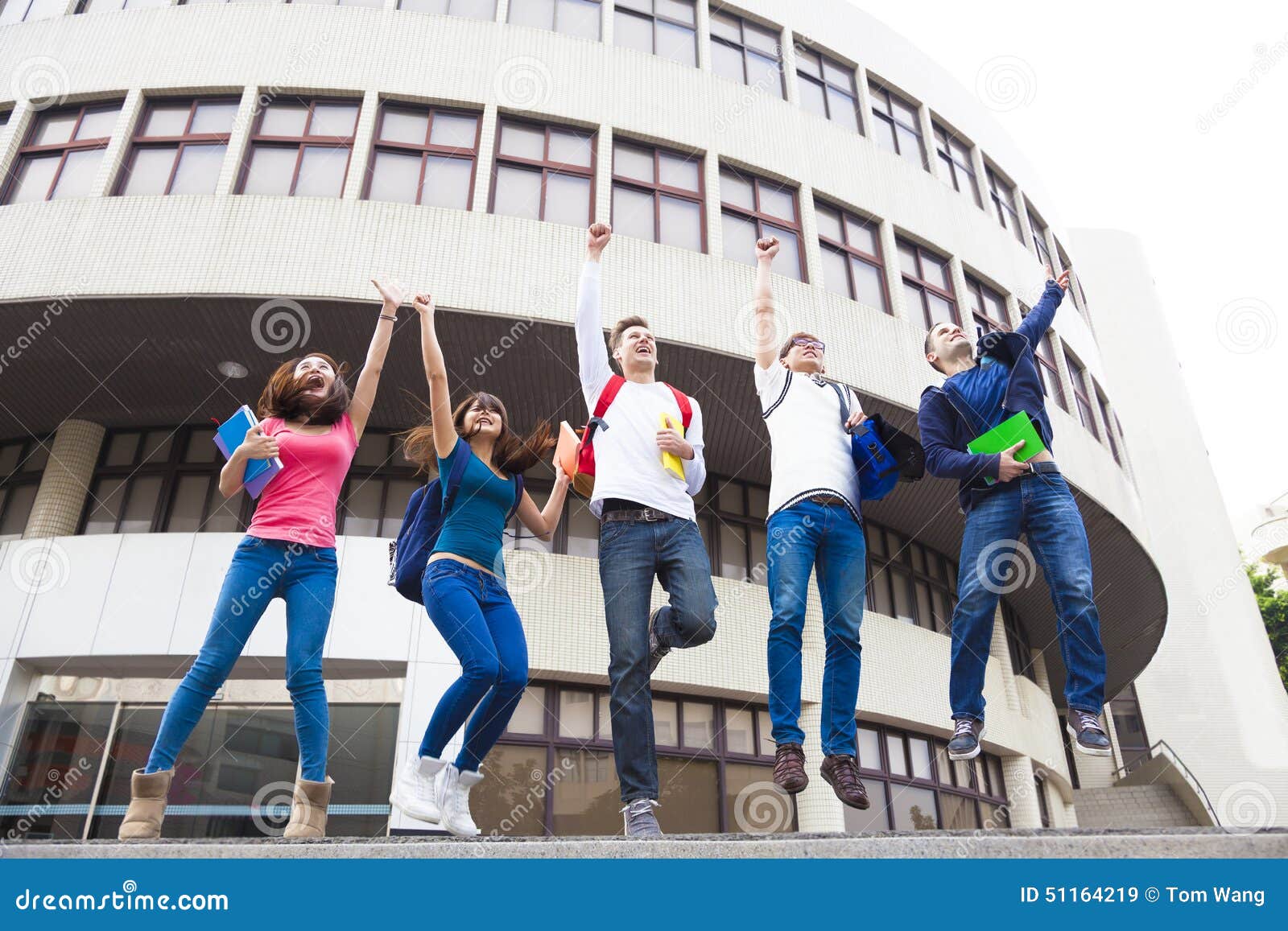 Young Group of Students Jumping Together Stock Image - Image of campus ...