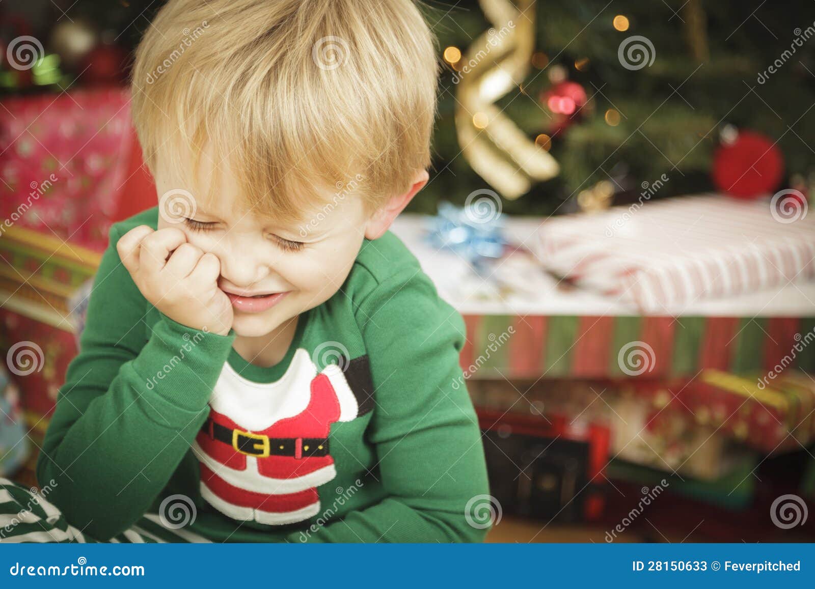 Young Grumpy Boy Sitting Near Christmas Tree Stock Image - Image of ...
