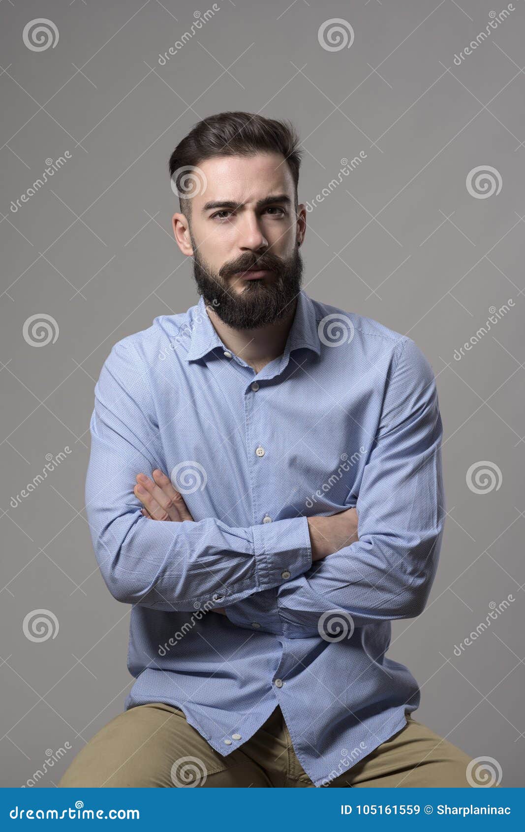 Young Grumpy Pessimistic Bearded Business Man with Crossed Arms Sitting ...