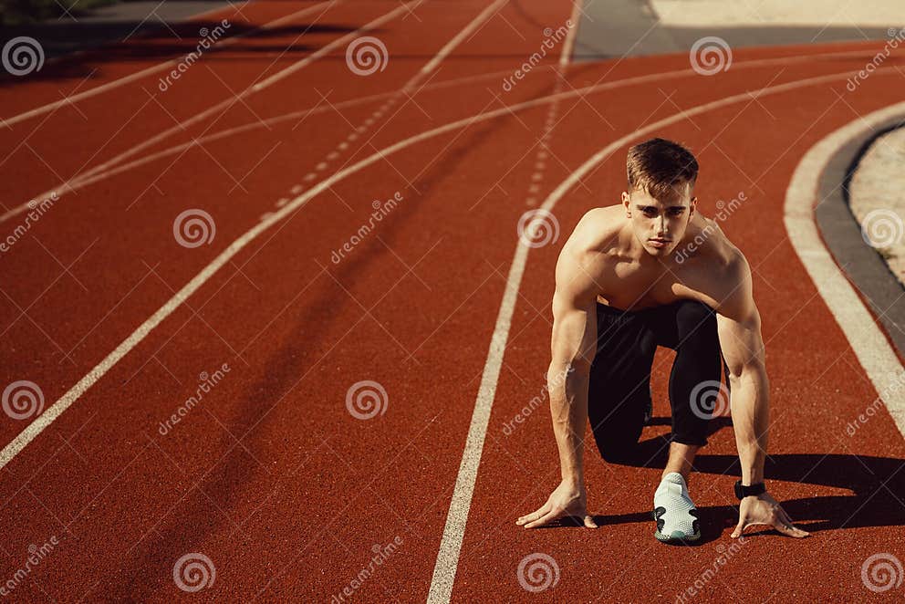 Young Guy with Athletic Body Getting Ready To Run Stock Photo - Image ...
