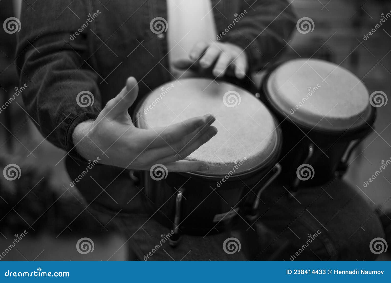A Young Guy with a Beard Plays Percussion Bongos Stock Image - Image of ...