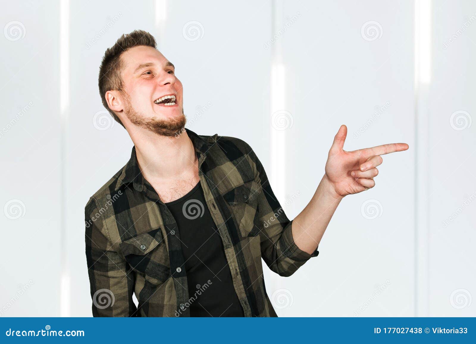 Young Guy with Beard Taunts and Shows Finger, Point Hand Stock Photo ...