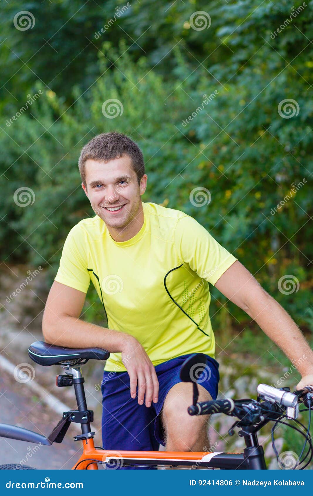 A Young Guy on a Bike Outdoors Stock Photo - Image of pose, handsome ...