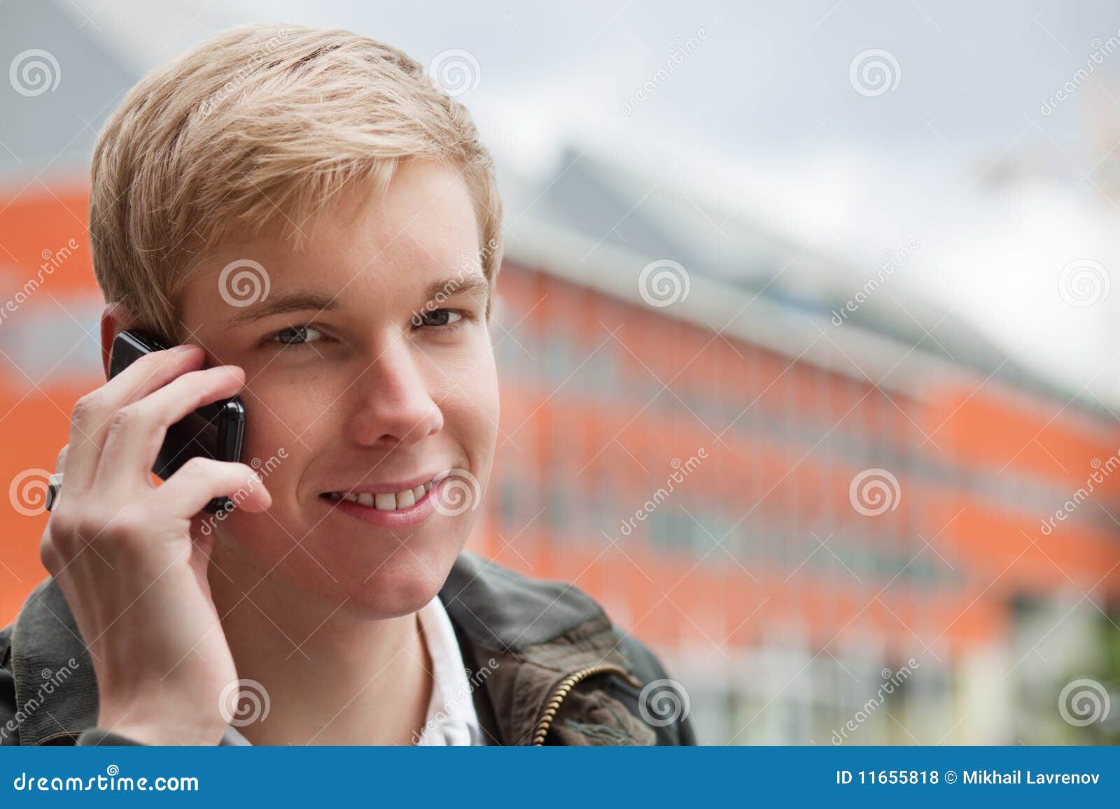 Young guy with cellphone stock photo. Image of copyspace - 11655818