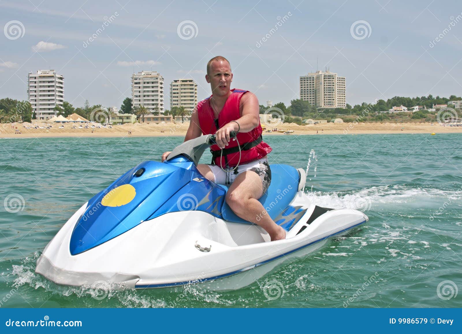 Young Guy Cruising on a Jet Ski Stock Image - Image of speed, horizon ...