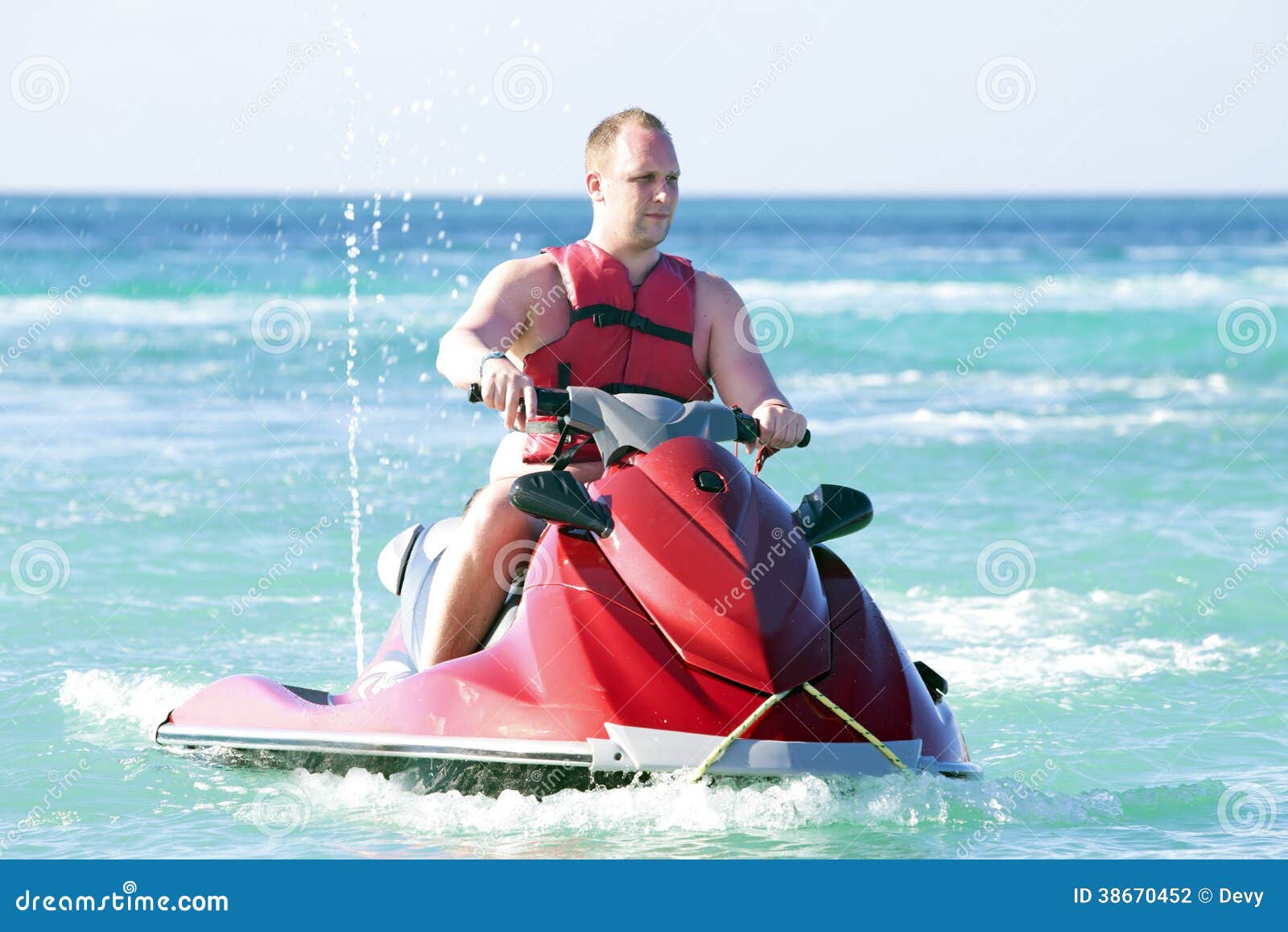 Young Guy Cruising on a Jet Ski Stock Photo - Image of blue, people ...