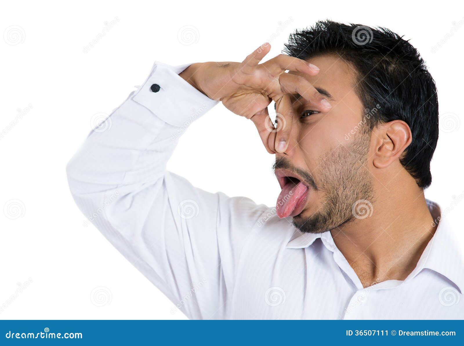 A Young Guy with Disgust on Face, Pinching Nose As Something Stinks ...