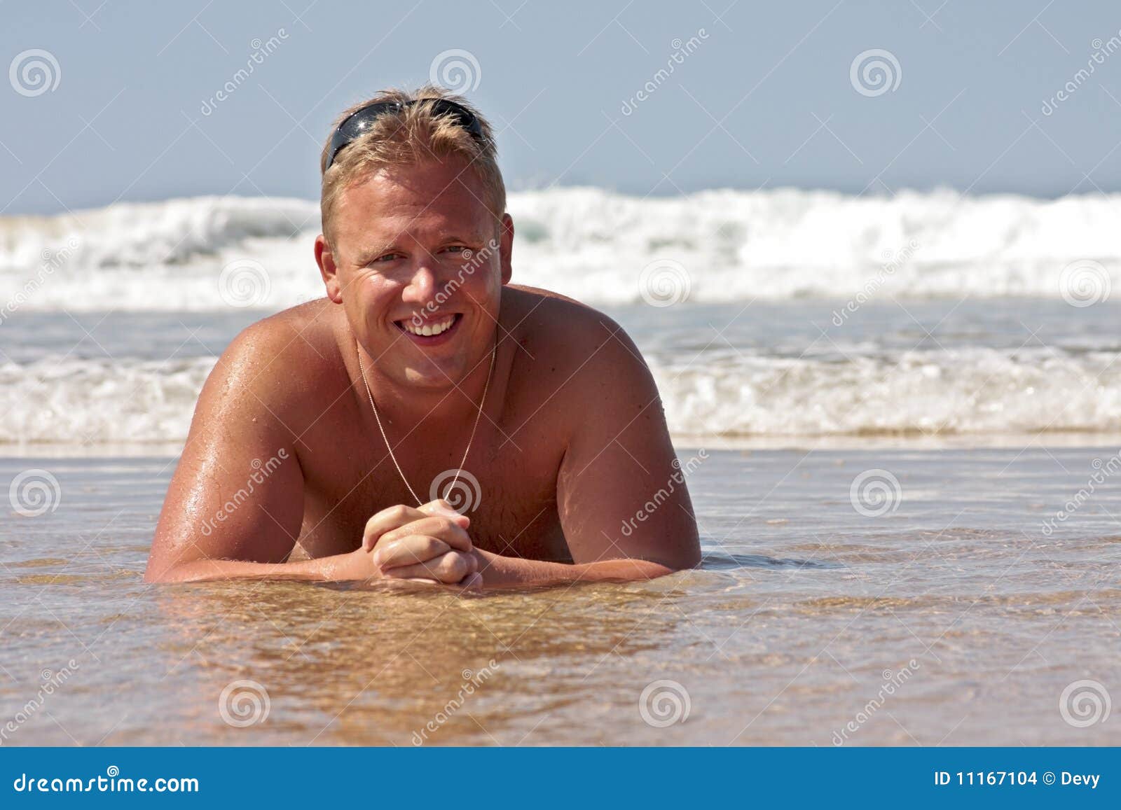 Young guy enjoying holiday stock photo. Image of water - 11167104