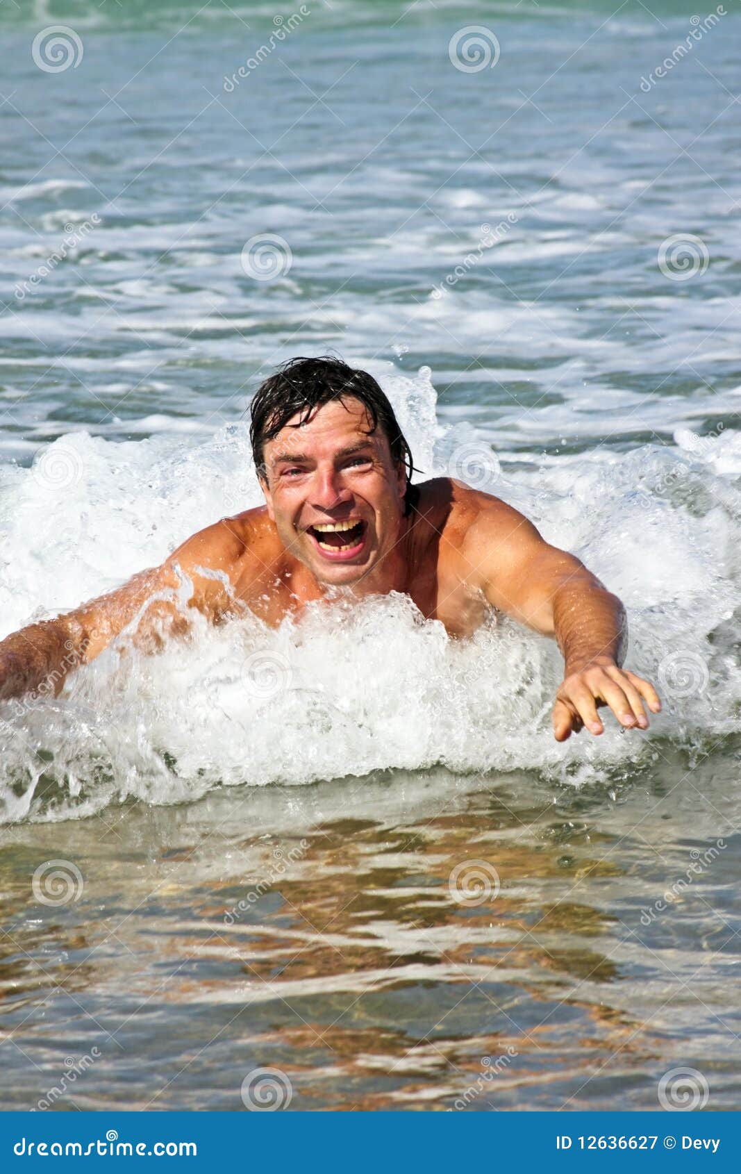 Young Guy Enjoying Swimming in the Ocean Stock Image - Image of ...