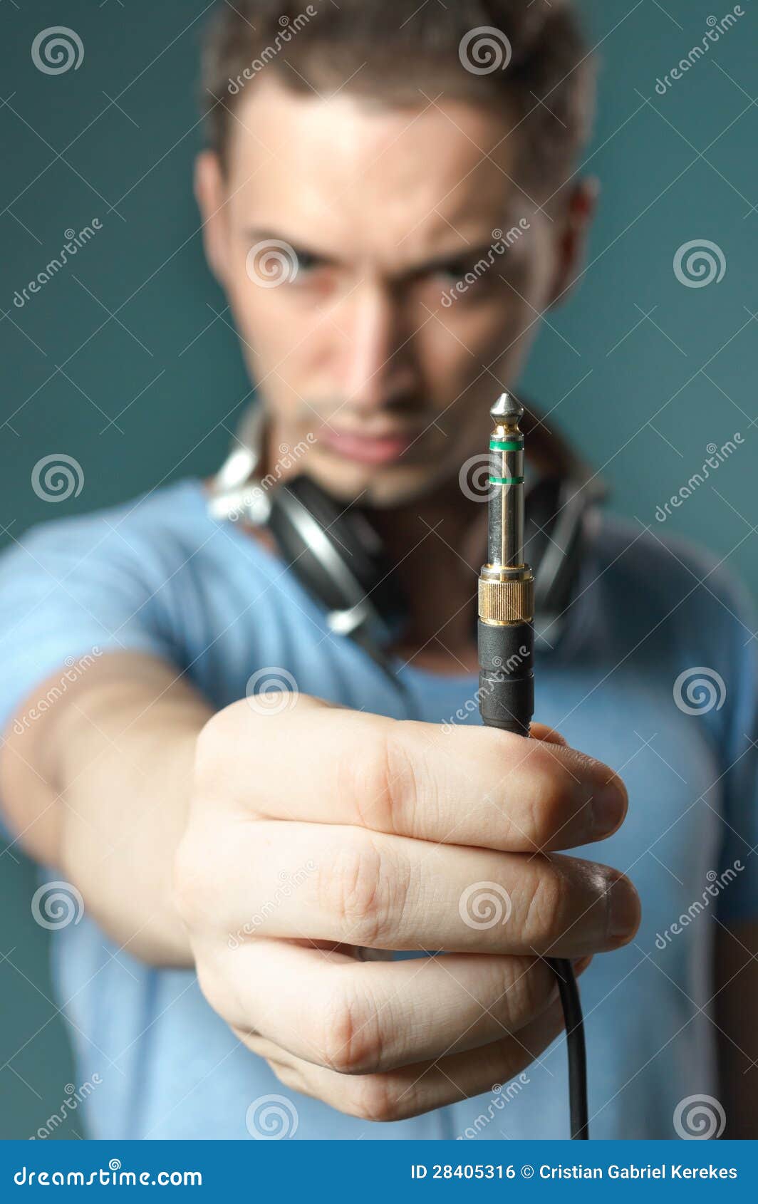 Young Guy Holding Stereo Jack Plug Stock Photo - Image of audio, detail ...