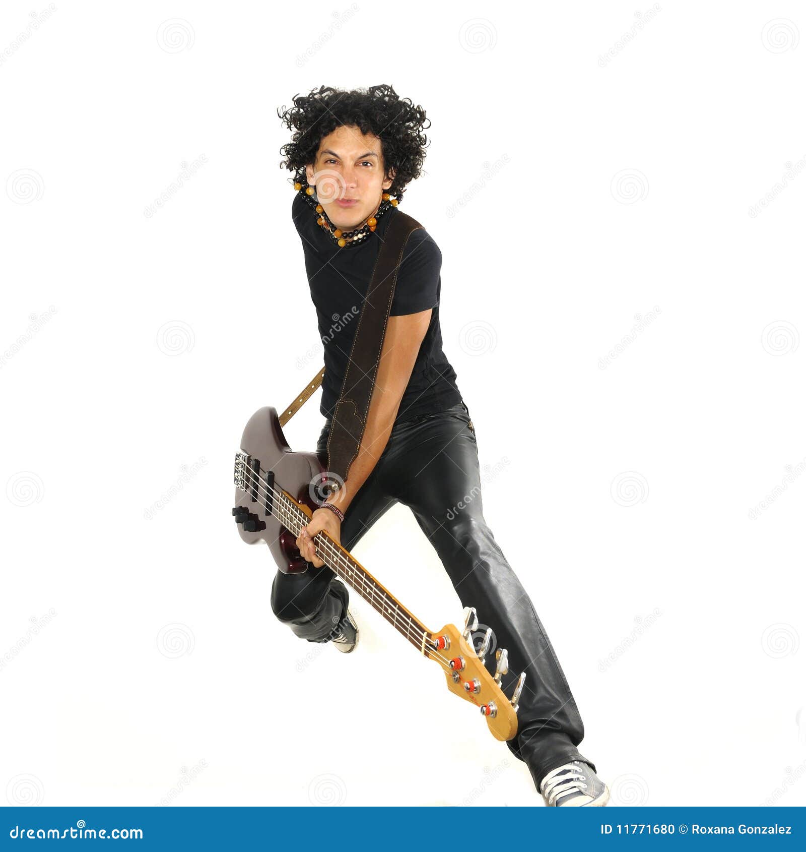Young Guy Jumping with Electric Bass Guitar Stock Photo - Image of ...
