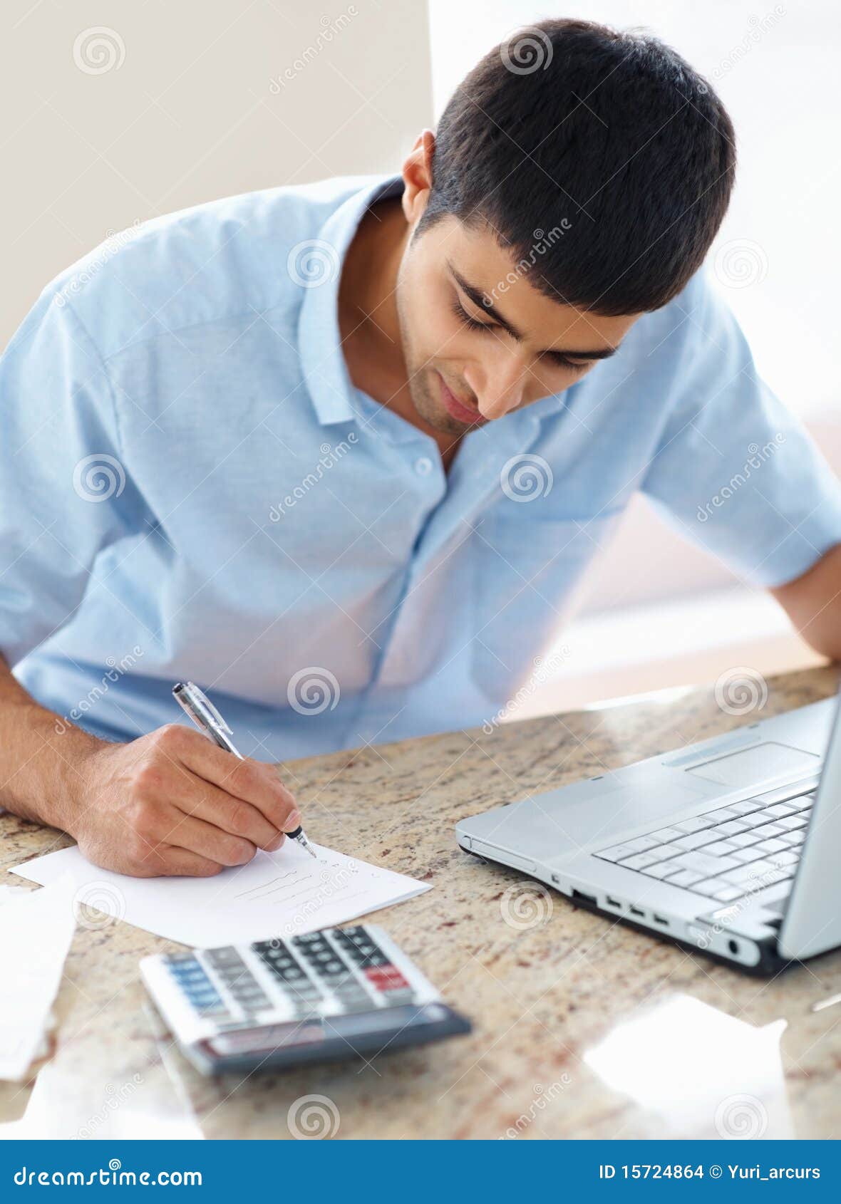 Young Guy with Laptop Doing Monthly Calculations Stock Photo - Image of ...