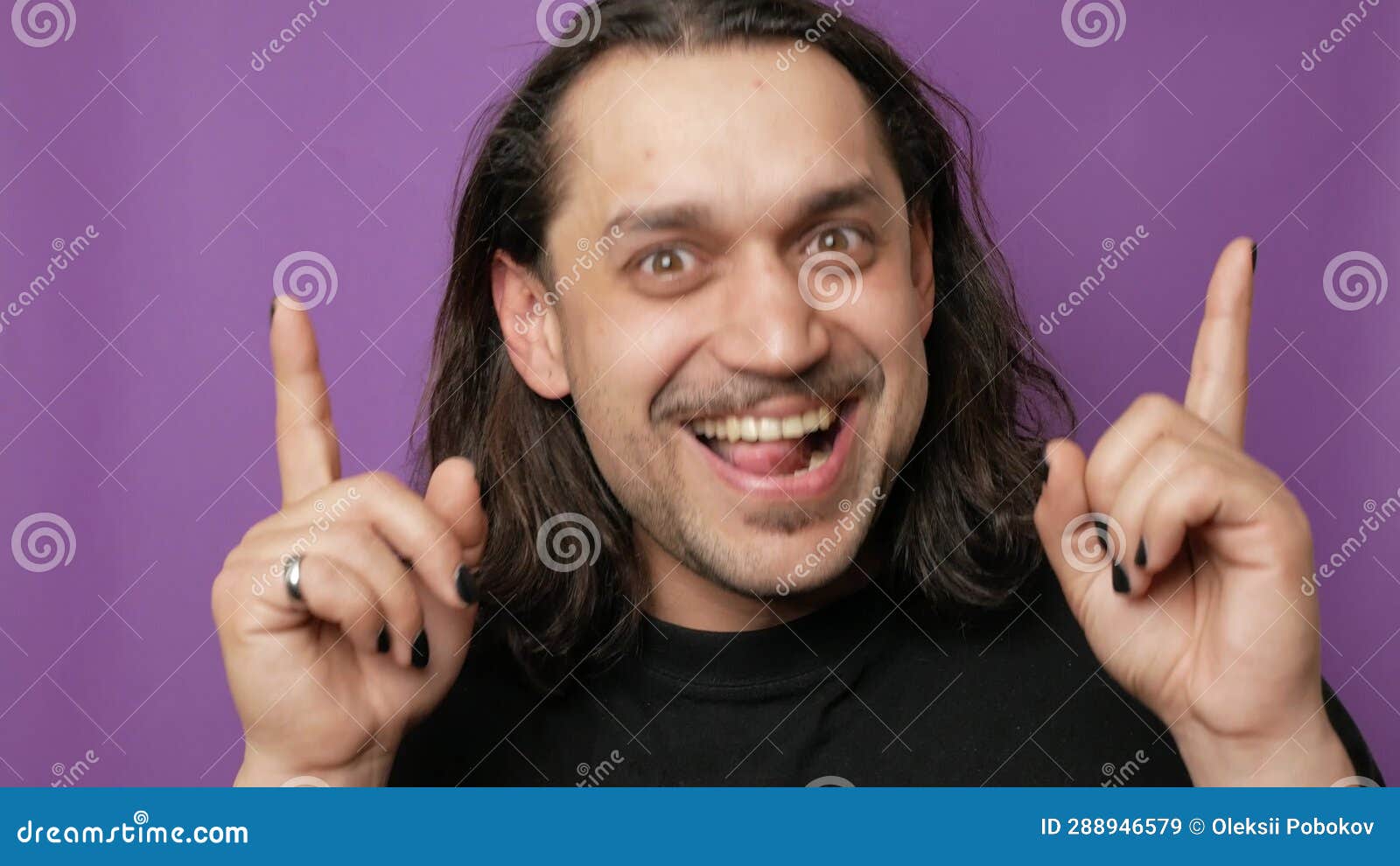 A Young Guy with Long Hair is Actively Thinking about the Problem Stock ...