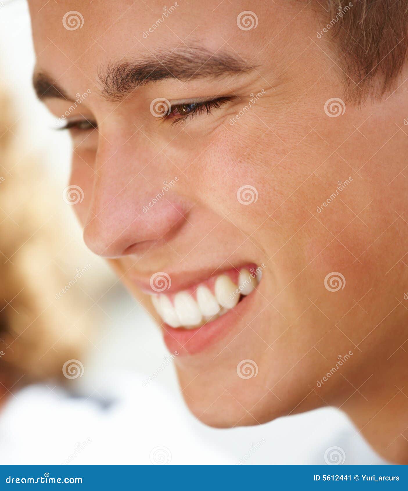 Young guy looking down stock image. Image of handsome - 5612441