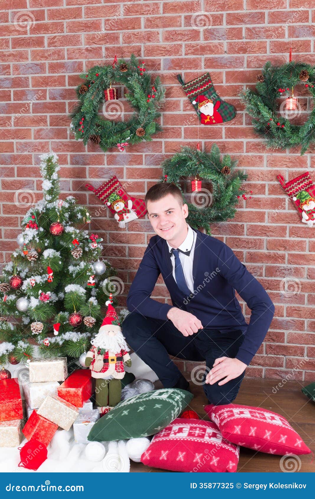 Young Guy Next To a Christmas Tree Stock Image - Image of people ...