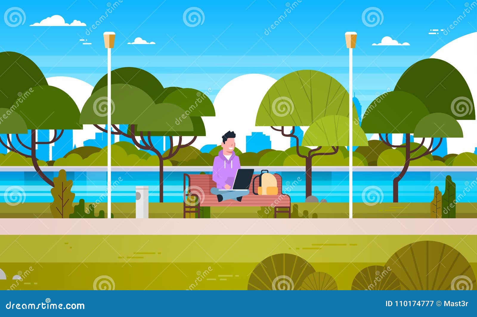 Young Guy in Park Using Laptop Computer Outdoors Sitting on Bench Stock ...