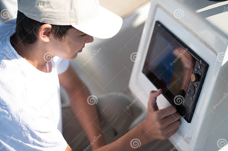 Young Guy Pressing Buttons on a Control Panel Stock Image - Image of ...