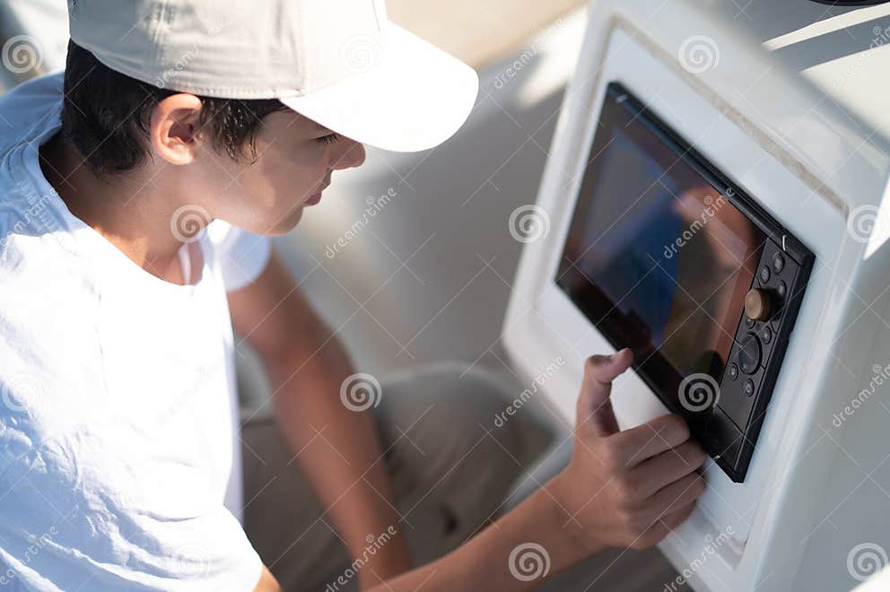 Young Guy Pressing Buttons on a Control Panel Stock Image - Image of ...