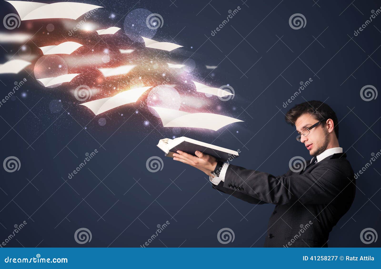Young Guy Reading a Book with Flying Sheets Coming Out of the Bo Stock ...