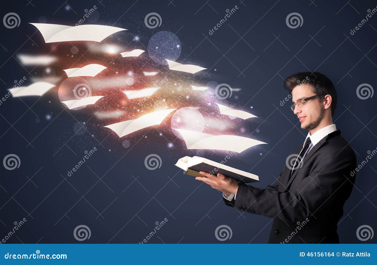 Young Guy Reading a Book with Flying Sheets Coming Out of the Bo Stock ...