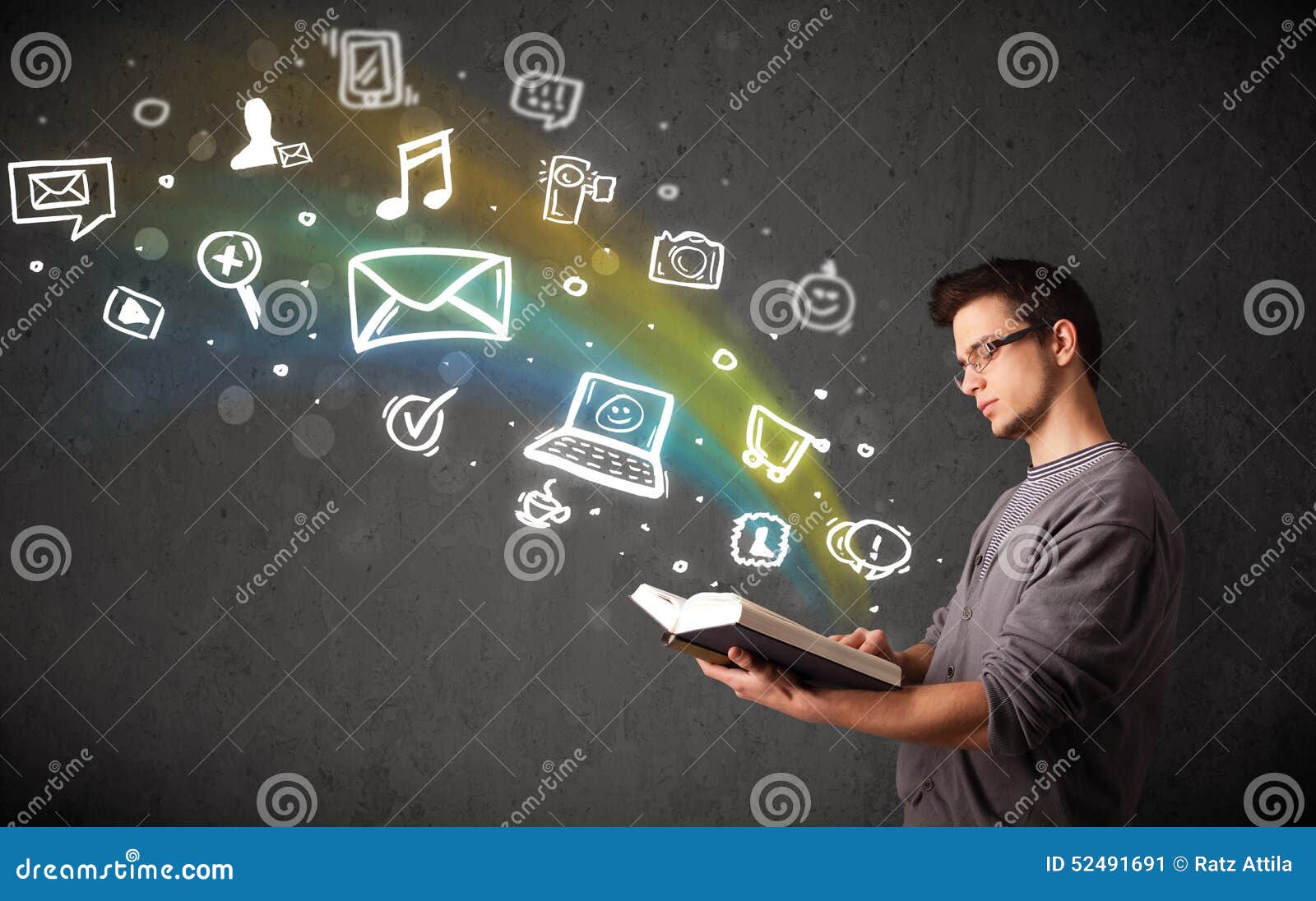 Young Guy Reading a Book with Multimedia Icons Coming Out of the Stock ...