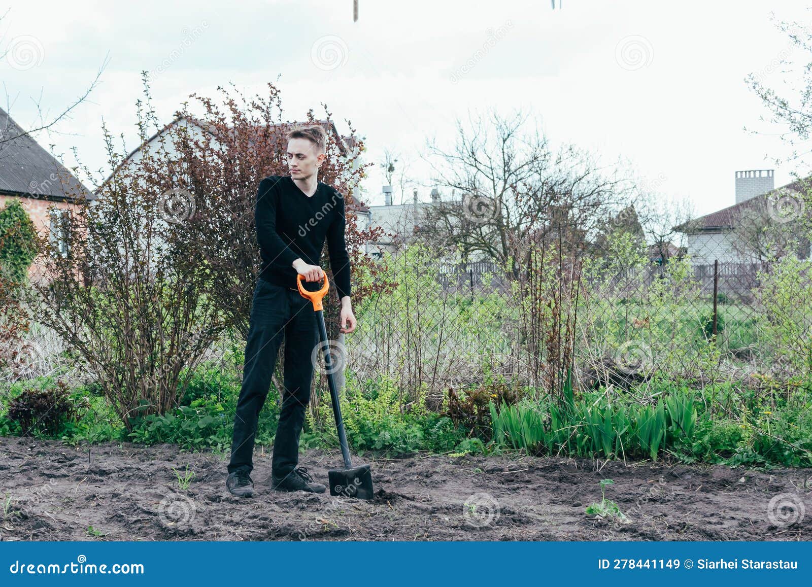 A Young Guy with a Shovel in the Backyard Stock Image - Image of tool ...