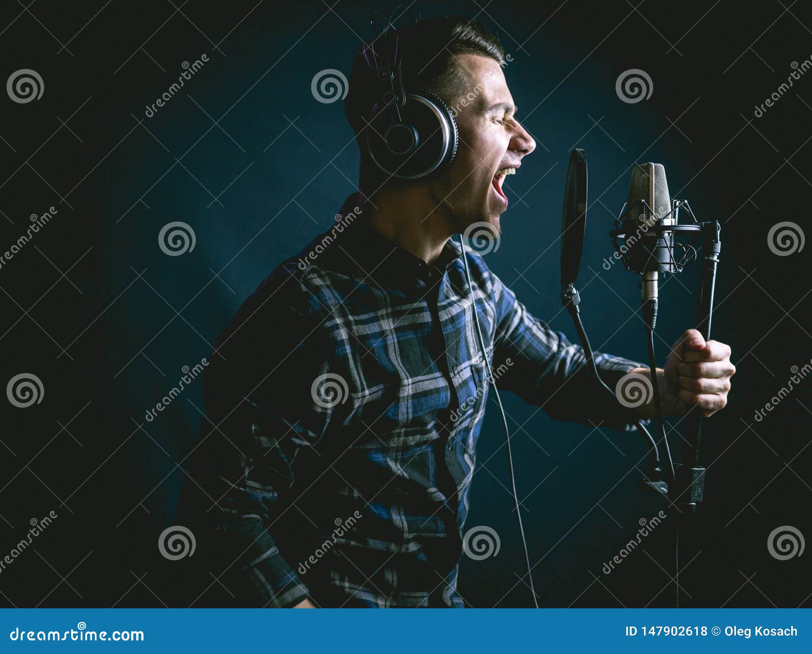 The Young Guy Singing in Recording Studio Stock Photo - Image of ...