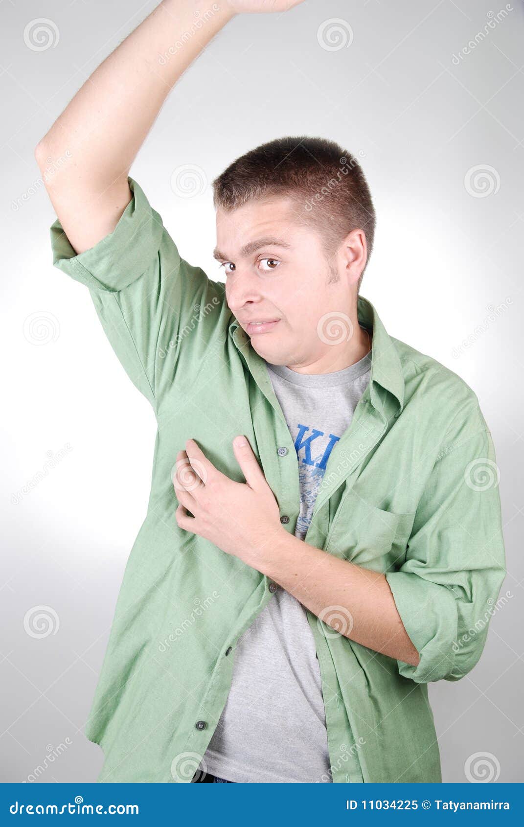 Young Guy Smelling His Armpit Stock Image - Image of handsome, disgust ...