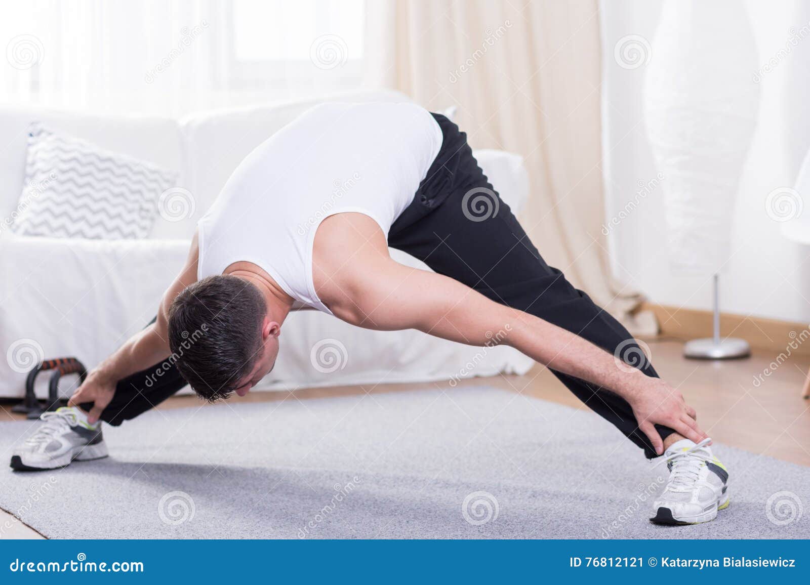 Young Guy Stretching His Body Stock Image - Image of shape, pillow ...