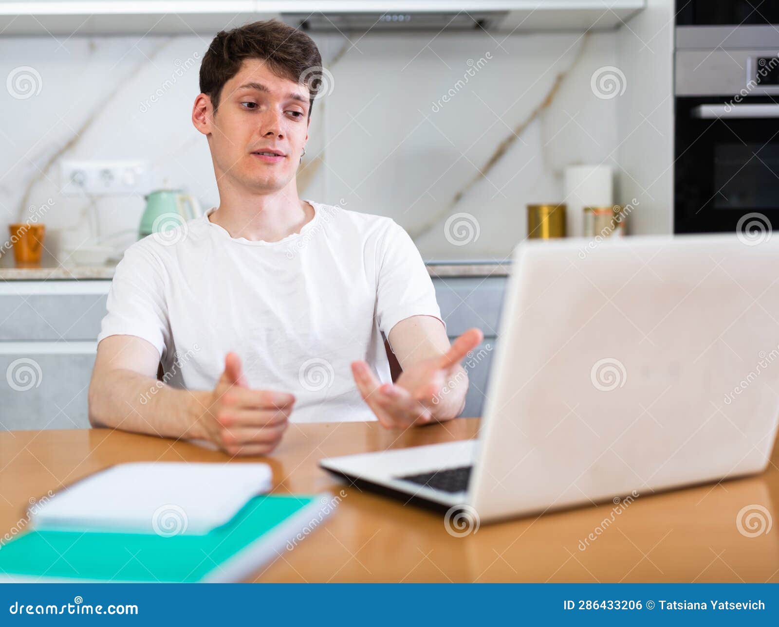 Young Guy Studying at Home with Laptop Stock Photo - Image of sitting ...