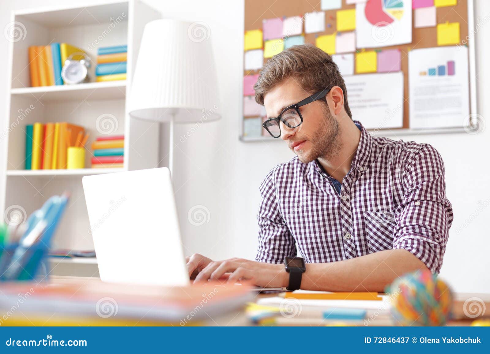 Young guy studying at home stock image. Image of tablet - 72846437