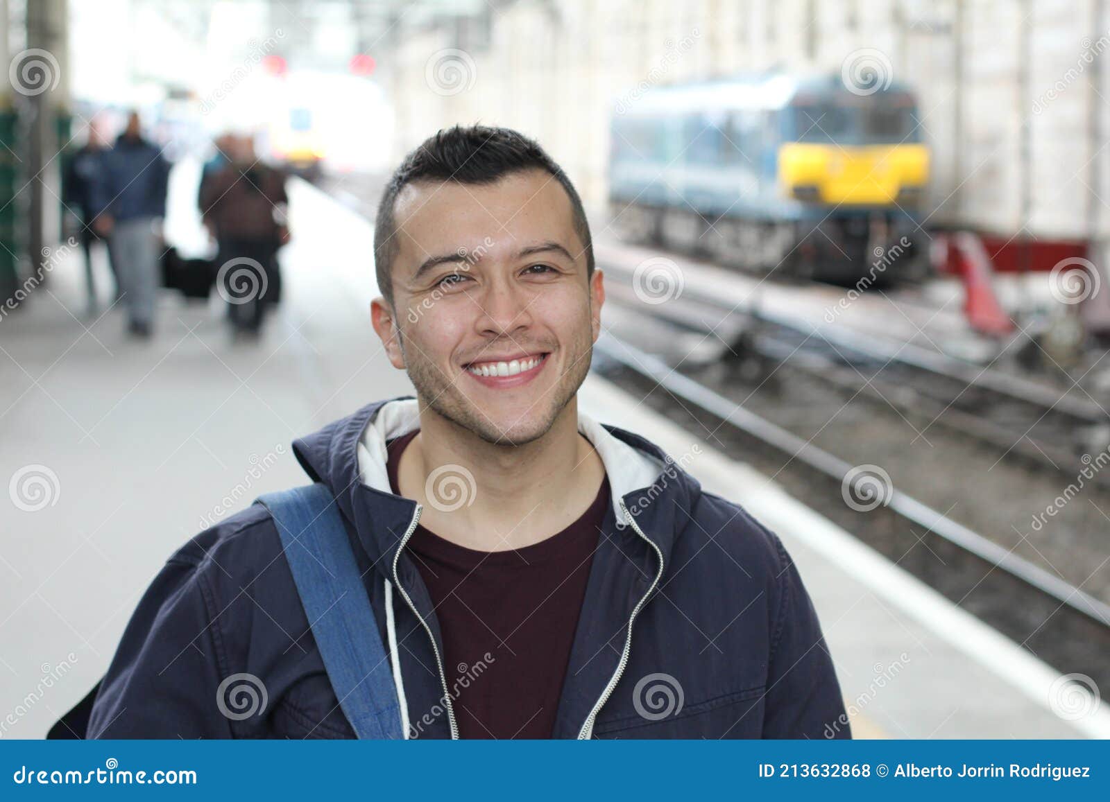Young guy in train station stock photo. Image of jacket - 213632868