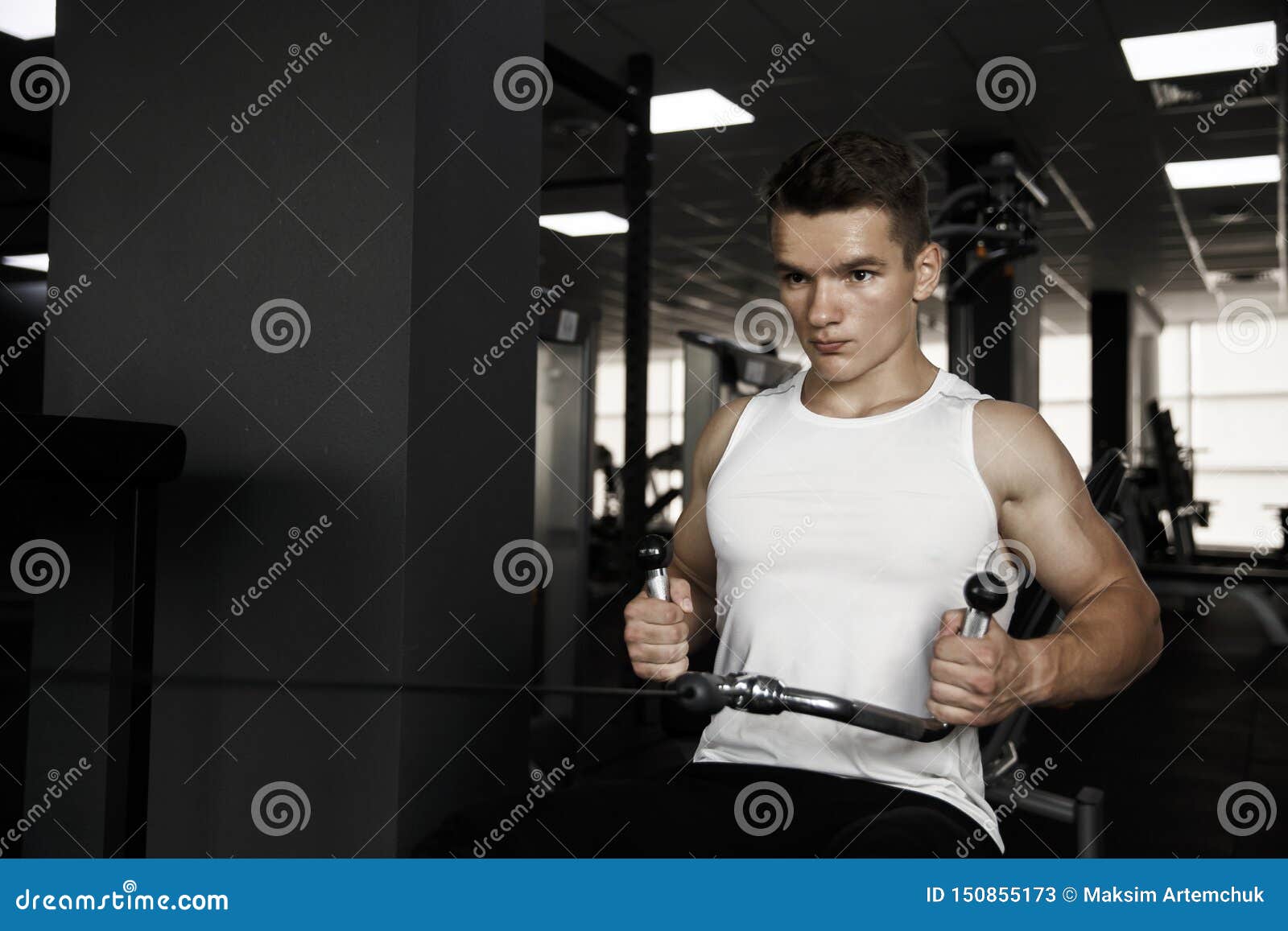 Young Guy is Training in the Gym Stock Image - Image of motion, side ...