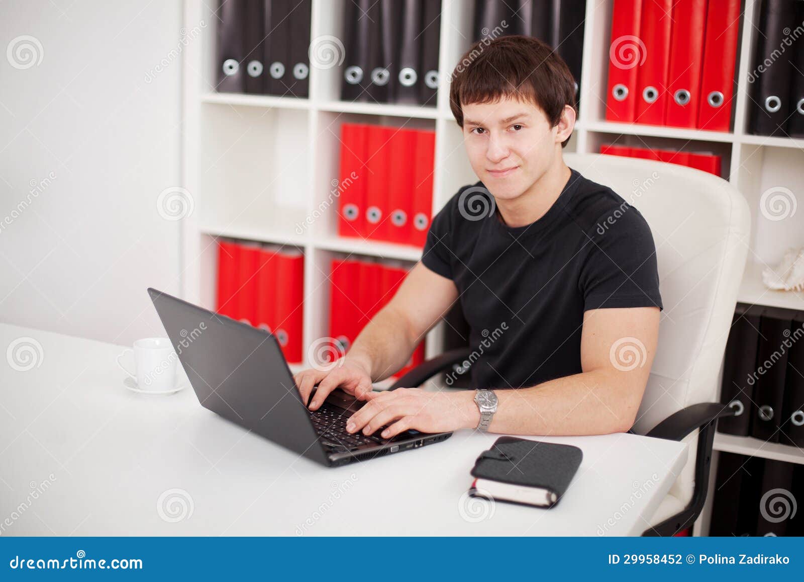 Young guy using laptop stock photo. Image of happy, notebook - 29958452