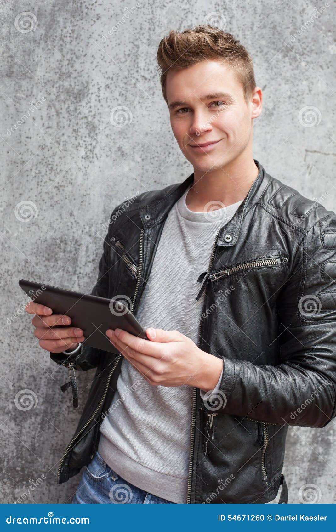 Young Guy Using Tablet Device Stock Photo - Image of pretty, jacket ...
