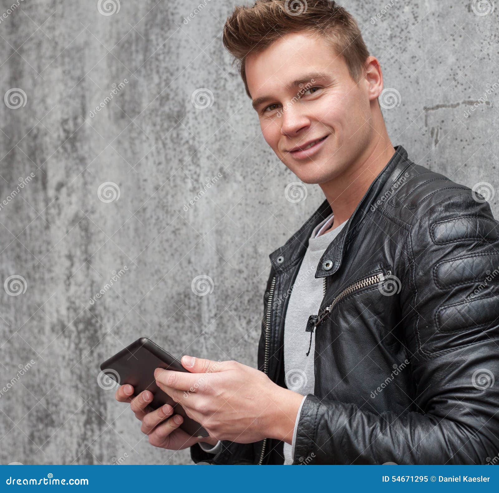 Young Guy Using Tablet Device Stock Image - Image of mobiel, concrete ...
