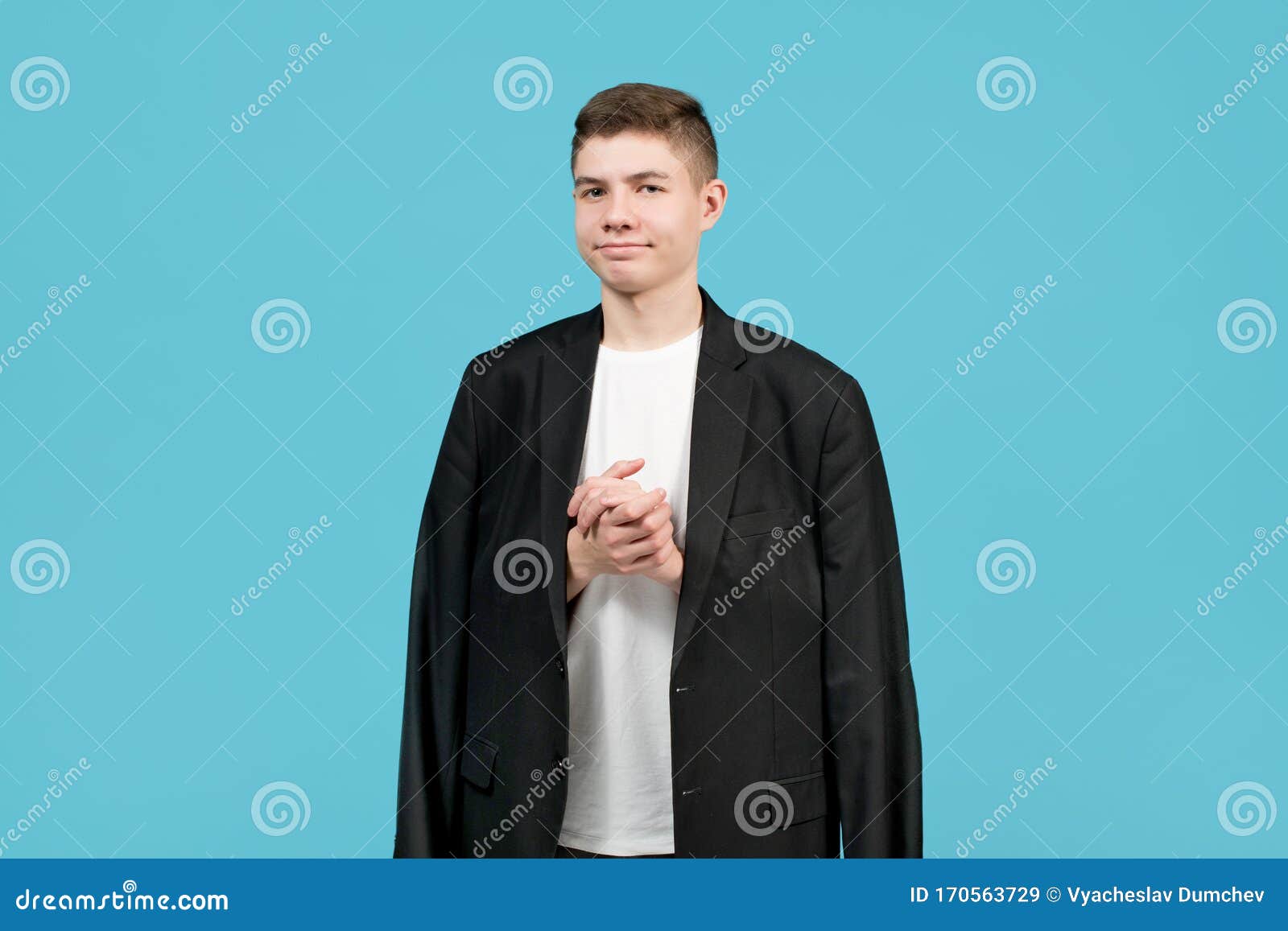 A Young Guy and a Very Large Jacket Stock Image - Image of clothing ...