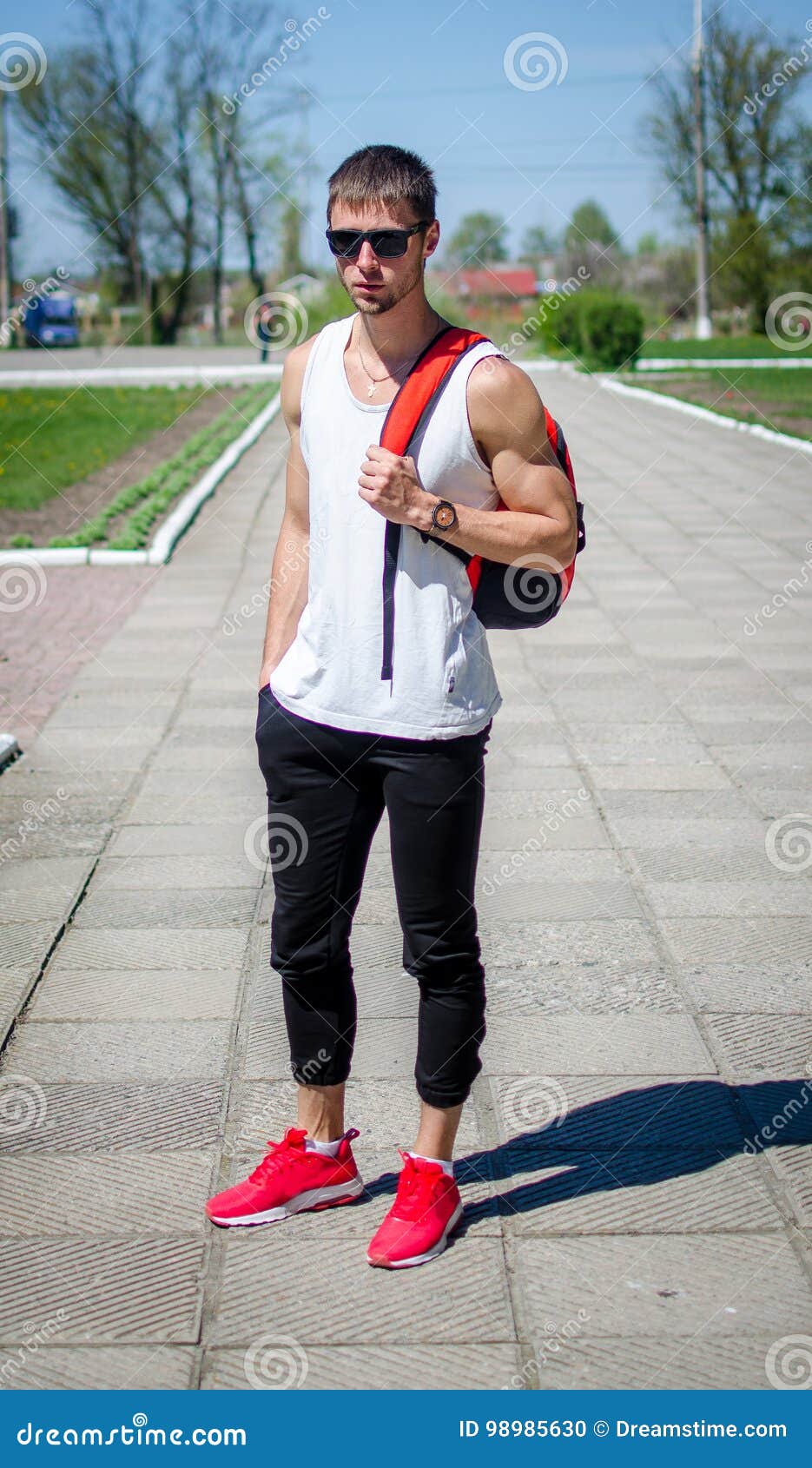 A Young Guy is Walking Down the Street Stock Photo - Image of athlete ...