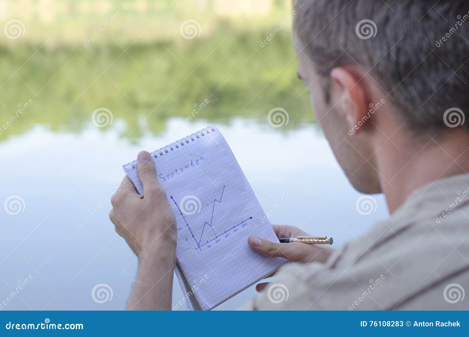 The Young Guy Writes in a Notebook Stock Image - Image of green, memory ...