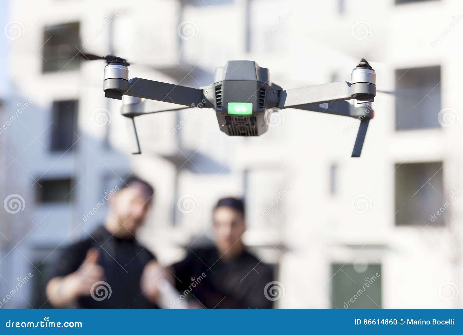 Young Guys are Flying a Drone Stock Photo - Image of recreation, remote ...