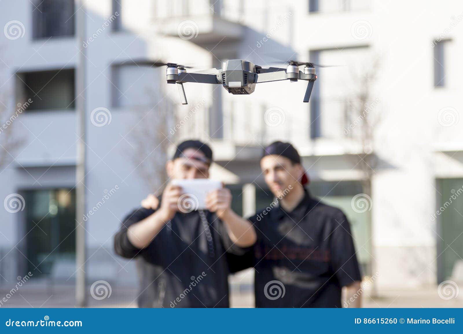 Young Guys are Flying a Drone Stock Photo - Image of propeller ...