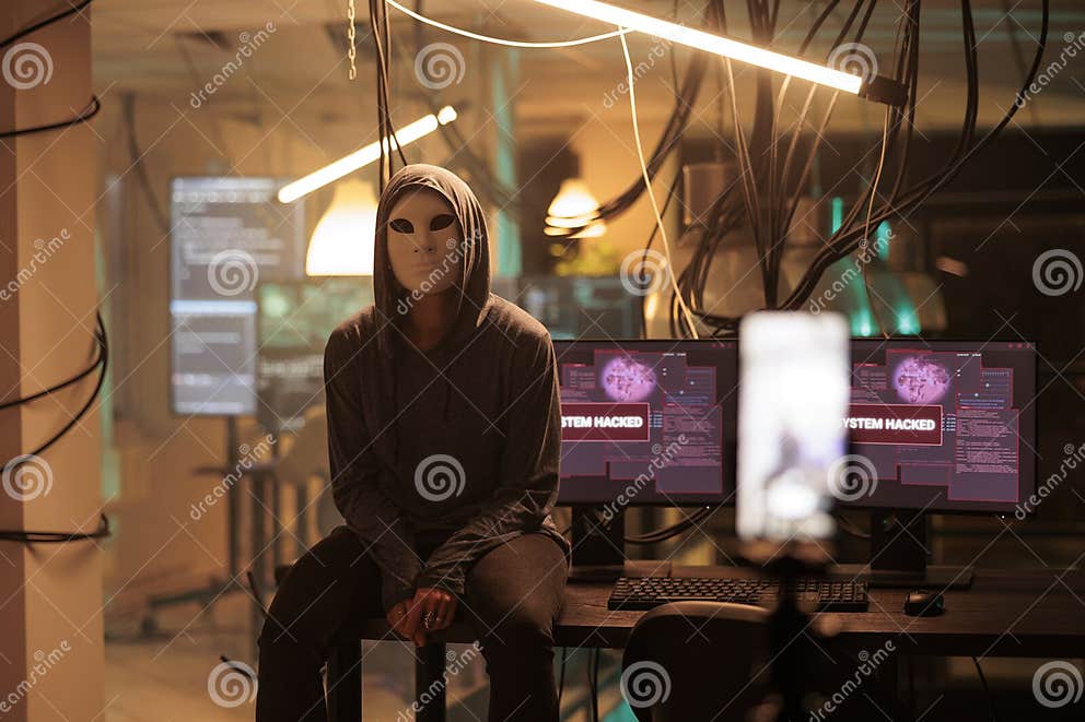 Young Hacker with Anonymous Mask Attacking Computer Server Stock Photo - Image of live ...