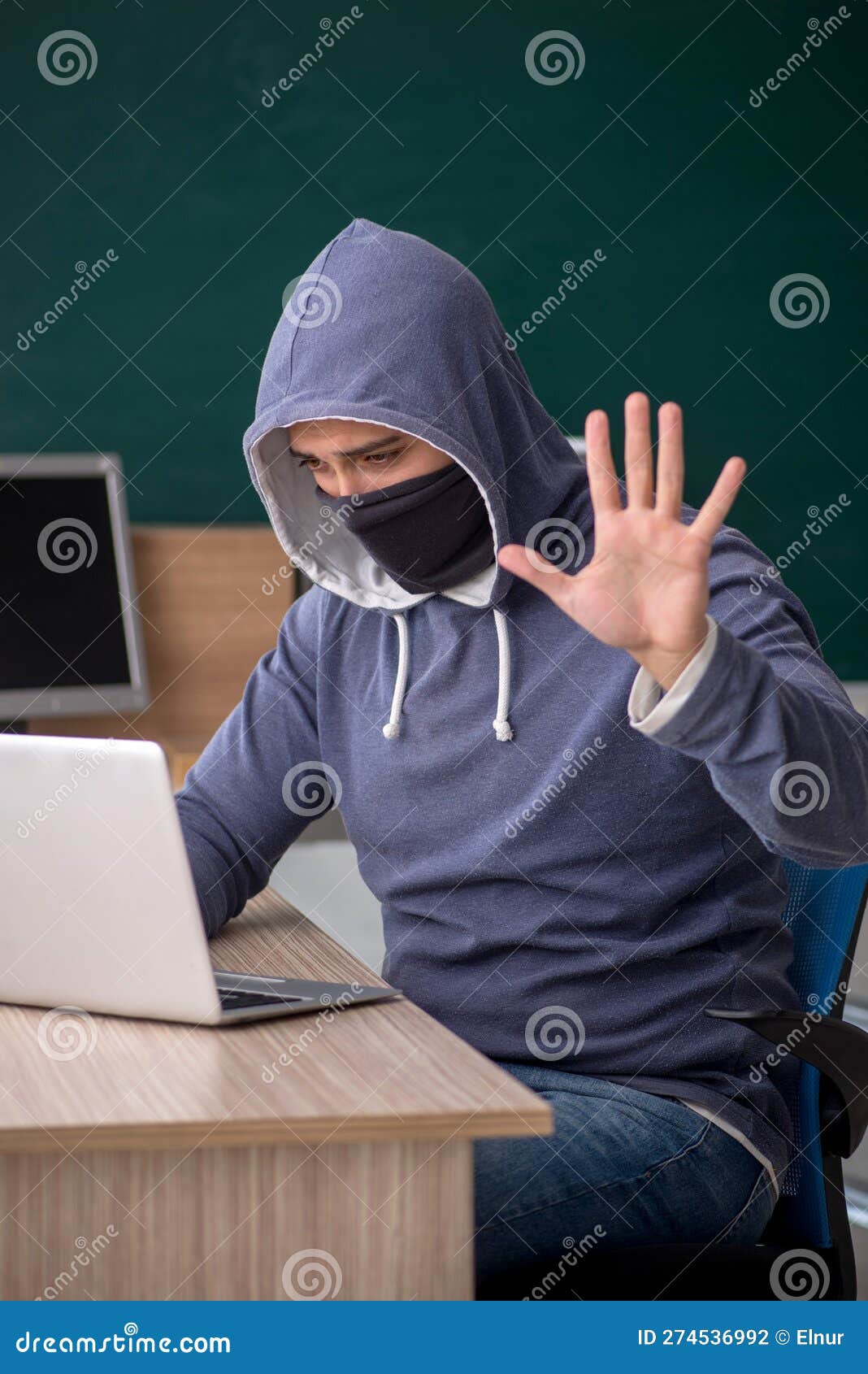 Young Male Hacker Sitting in the Classroom Stock Photo - Image of ...